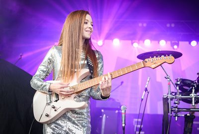 Maddie Rice playing alongside Big Wild.